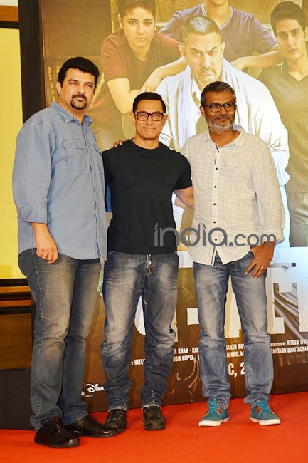 Nitesh Tiwari, Aamir Khan and Sidharth Roy Kapur at Dangal poster launch