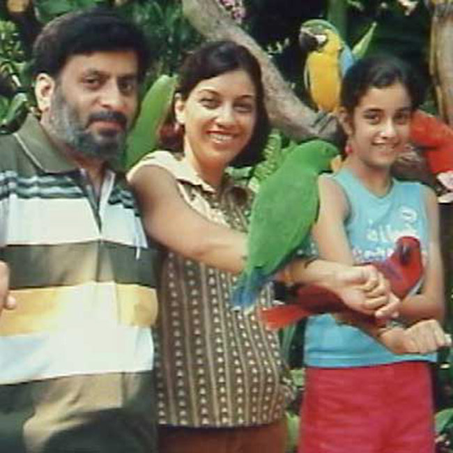 Little Aarushi Talwar with her parents Nupur and Rajesh Talwar