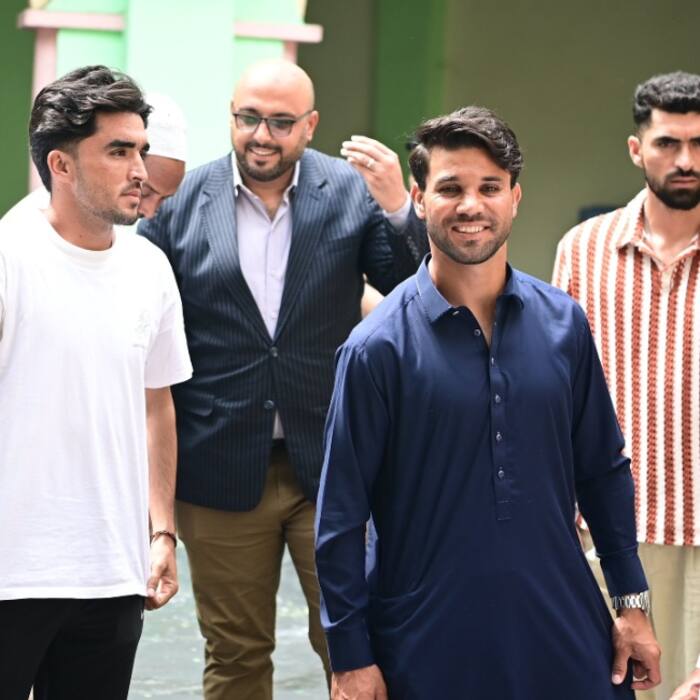 Afghanistan cricketers Qais Ahmad, Ibrahim Zadran and Yama Arab at the Greater Noida mosque on ...