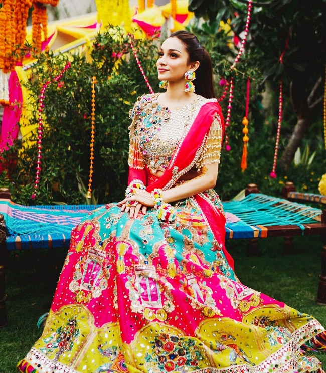 Alfia Jaffry's wedding look: From golden suit to red lehenga