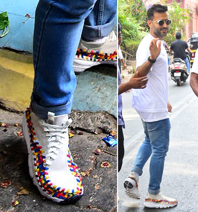 Anand Ahuja posing for photogs with wife Sonam Kapoor