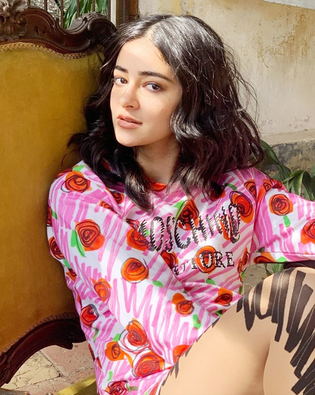 Ananya Pandey Flaunts Her Perfect Figure In White Crop And Mini Skirt