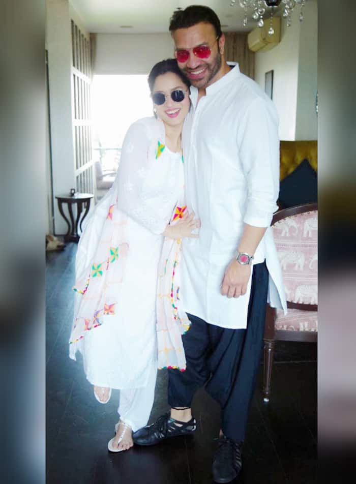 Ankita Lokhande poses with Vicky Jain in white
