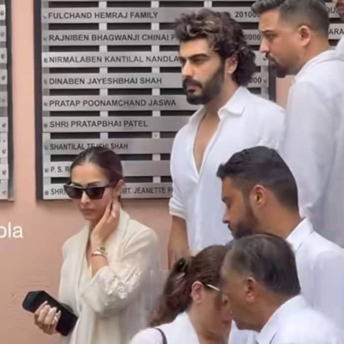 See Photos: Arjun Kapoor stays close to Malaika Arora to keep a check ...