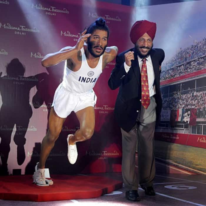 Athlete Milkha Sigh with his wax statue in Delhi’s Madame Tussauds museum