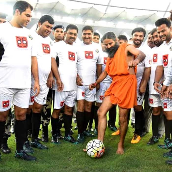 IN PICS: Baba Ramdev shows off his football skills during Football ...