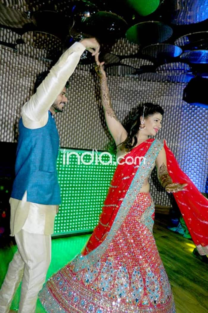 Sambhavna Seth poses on a tractor before her Mehendi ceremony