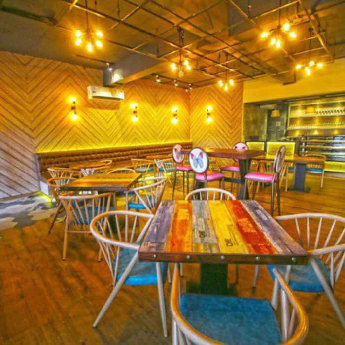 Air Hostess serving food inside Hawai Adda Restaurant in Ludhiana