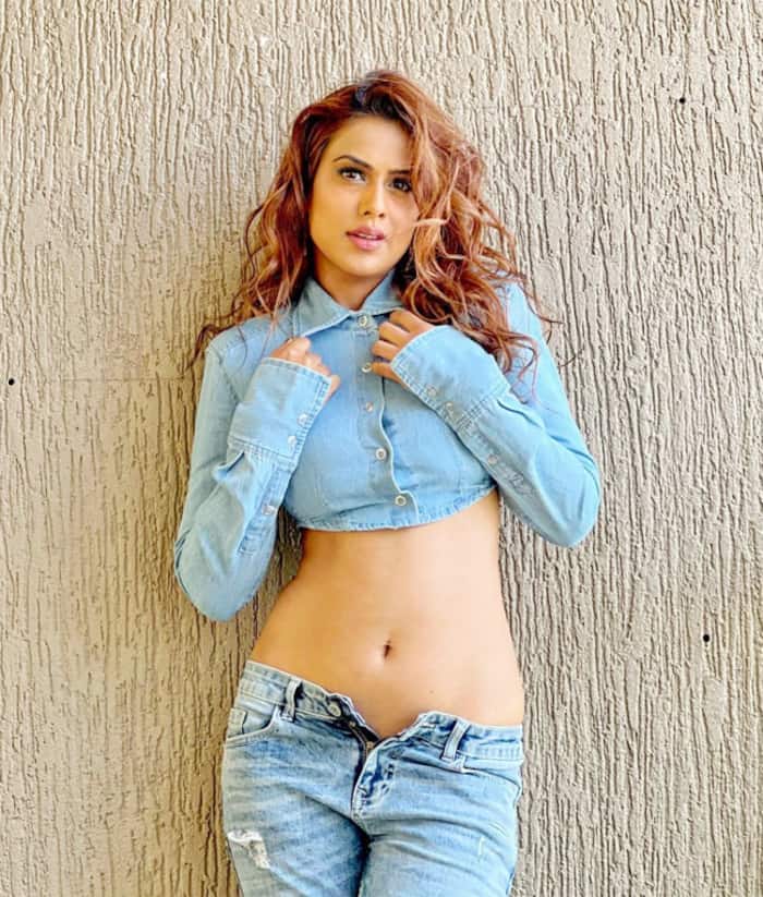 Nia Sharma Poses in Unbuttoned Jeans And Cropped Shirt in Bold Photos ...