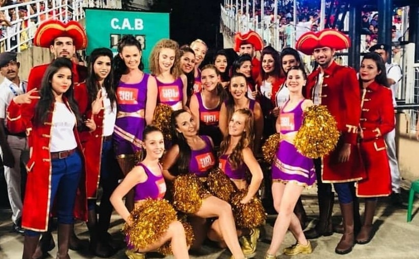 Cheerleaders Gang up to Make The Gardens Prettier