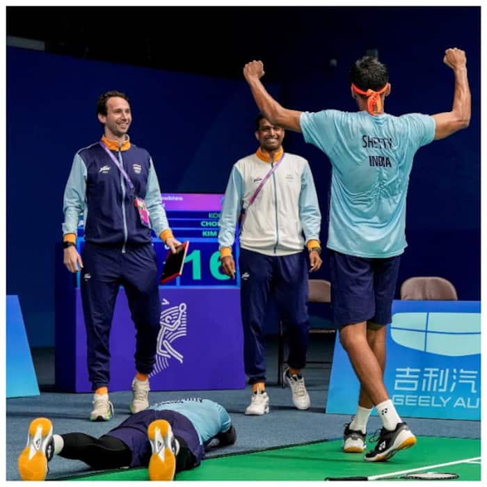 India's Chirag Shetty celebrates in Hangzhou on Saturday after winning ...