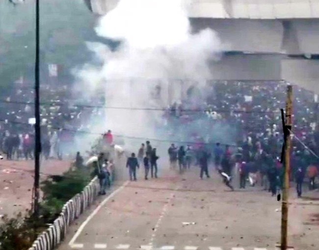 Demonstrators Turn Violent, Throw Stones at Police Personnel