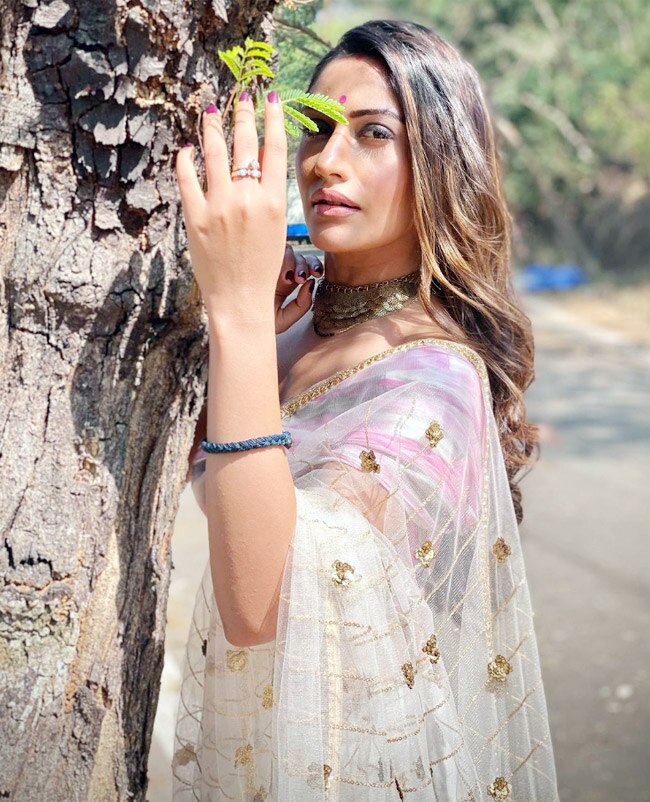 Surbhi Chandna looks sensational in a sheer saree