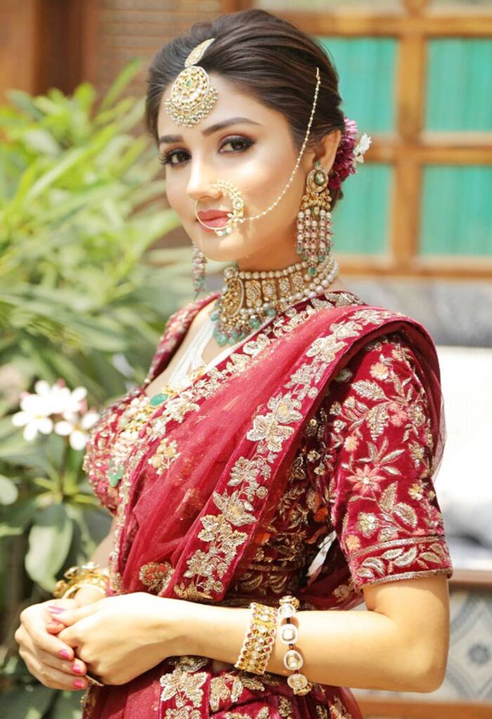 Donal Bisht Mesmerises as Bride in Heavily Embroidered Maroon Lehenga ...