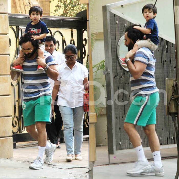 Taimur enjoys a piggy back ride