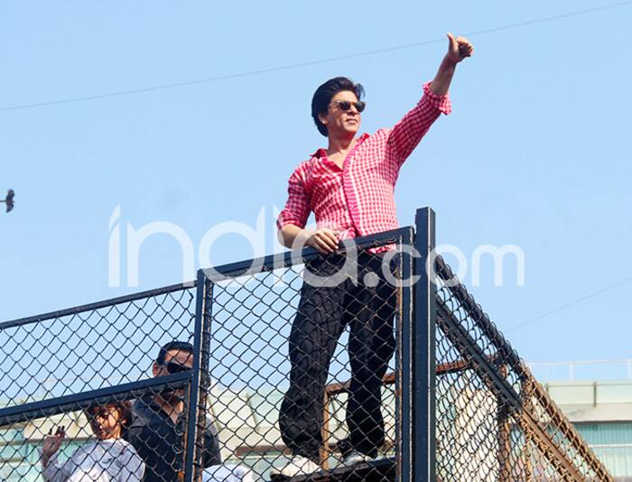 Shah Rukh Khan And AbRam Khan Wave to Fans at Mannat