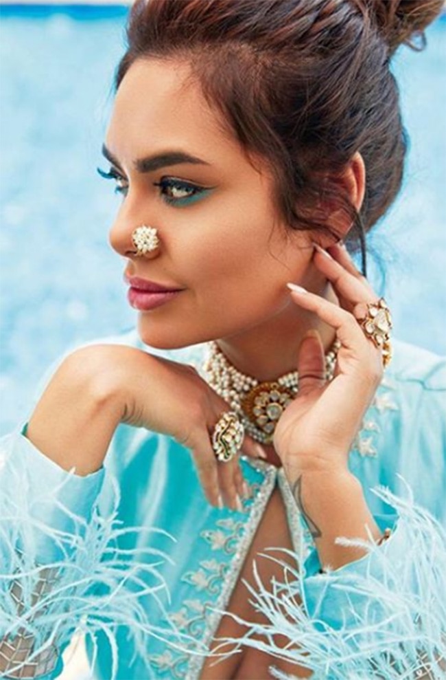 Esha Gupta strikes a pose in green attire