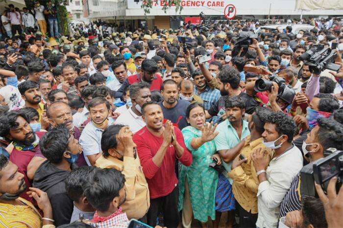 Puneeth Rajkumar Dies Photos Capture Heartbroken Fans Wait Outside