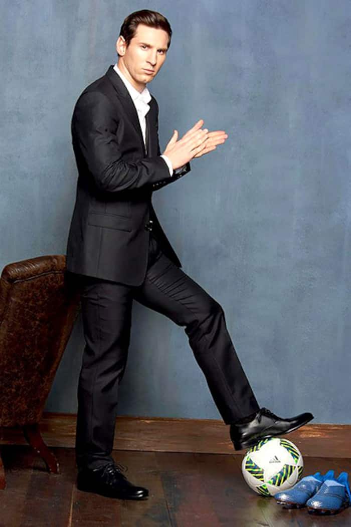 Lionel Messi poses in black formals for Sports Illustrated magazine ...