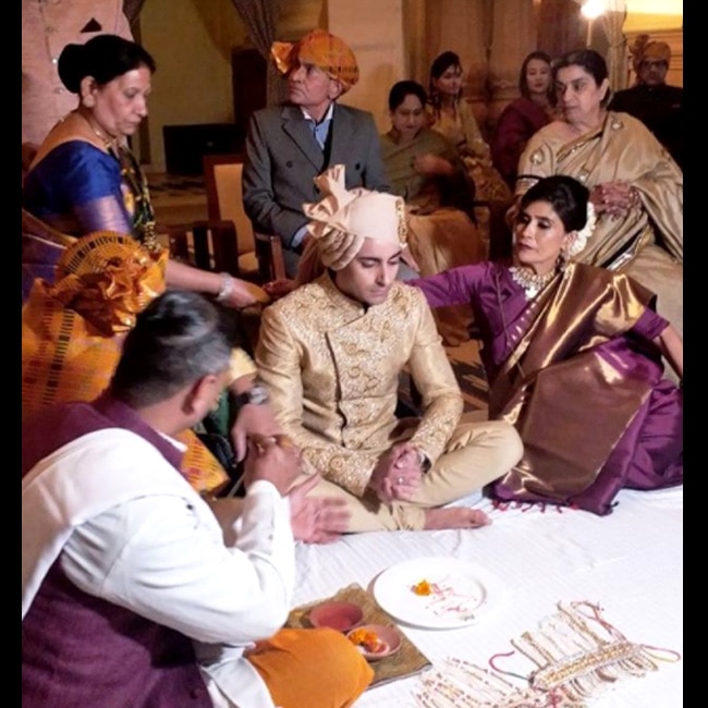 Pankhuri Rode with husband Gautam Rode with wedding guests