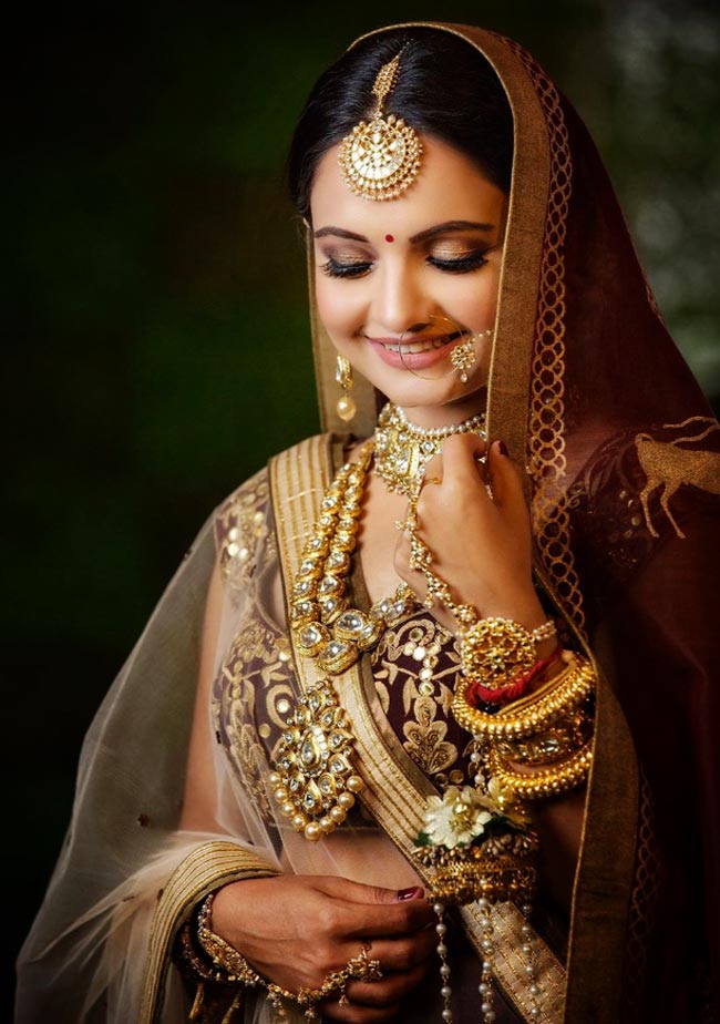 Gopi Bahu Aka Giaa Manek's Bridal Look in Maroon Lehenga And Statement ...