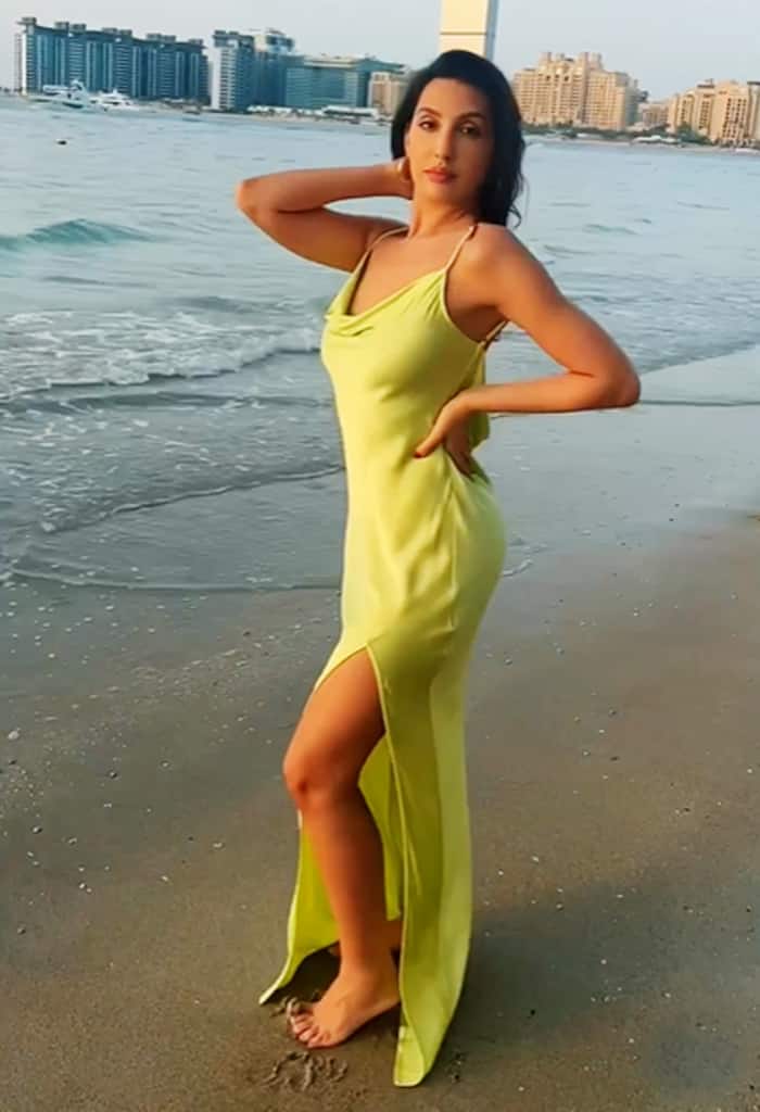Nora Fatehi Flaunts Her Hot Bod on Beach in Bodycon Gown With Thigh ...