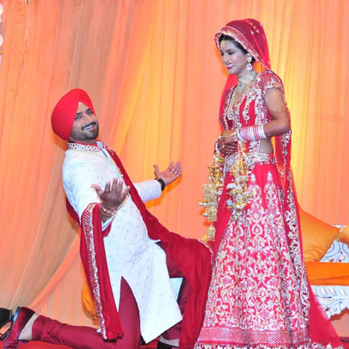 Suresh Raina poses with wife Priyanka Chaudhary during their wedding