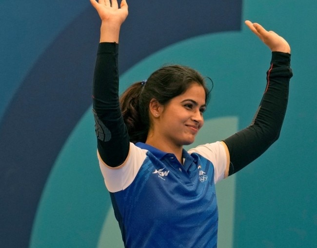 India's Manu Bhaker celebrates after winning the bronze medal in the ...