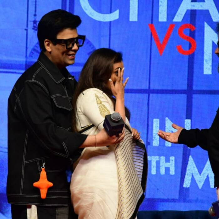 Rani Mukerji Embarrasses Karan Johar by Touching His Feet on Stage ...