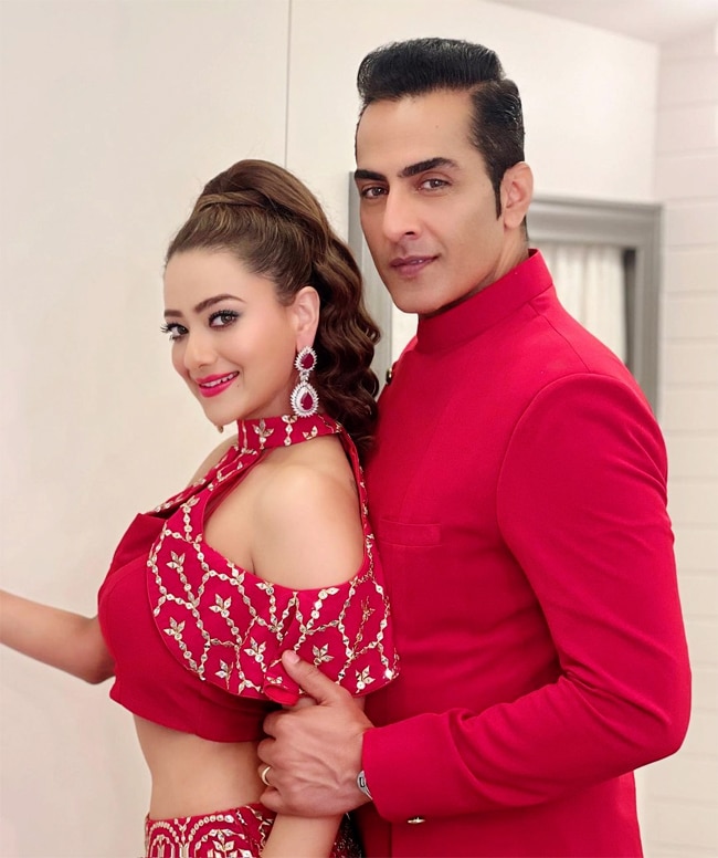 Kavya And Vanraj Shah Spread Their Magic in Red