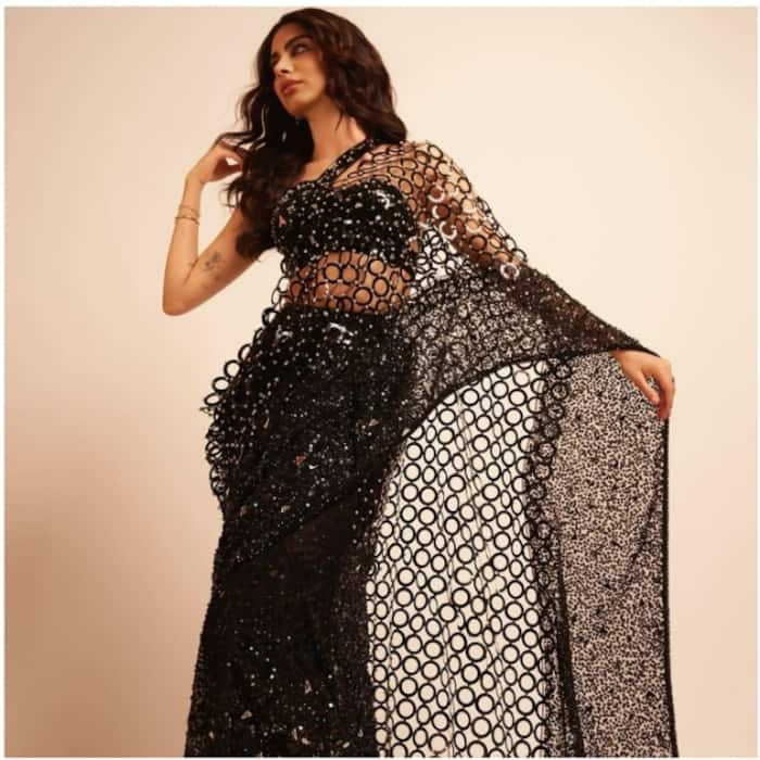 Khushi Kapoor approved black blingy saree
