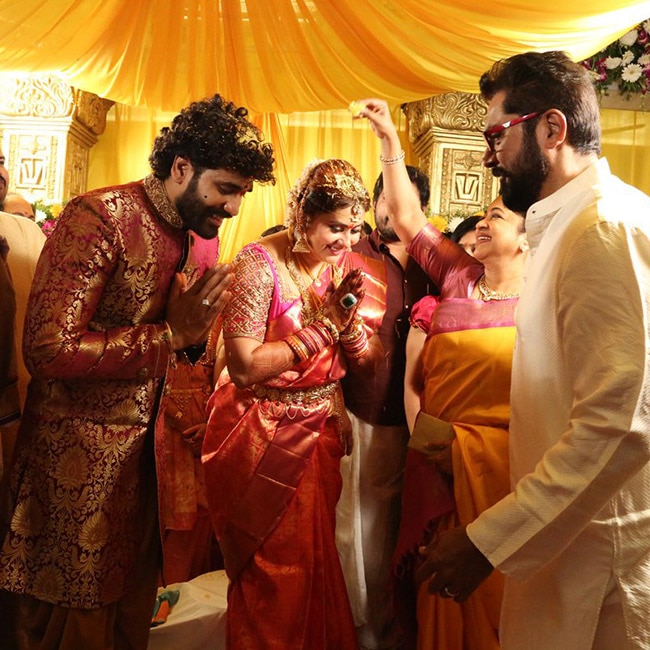 Bigg Boss Tamil contestant Namitha with husband Veerendra Chowdhary