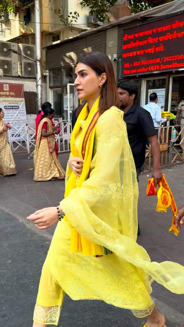 Photos: Kriti Sanon Shines Bright in Yellow Suit as She Visits Siddhivinayak Temple Ahead of ...
