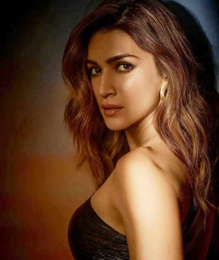 Kriti Sanon Raises Hotness In Winters Wears Sexy High Slit Black Dress