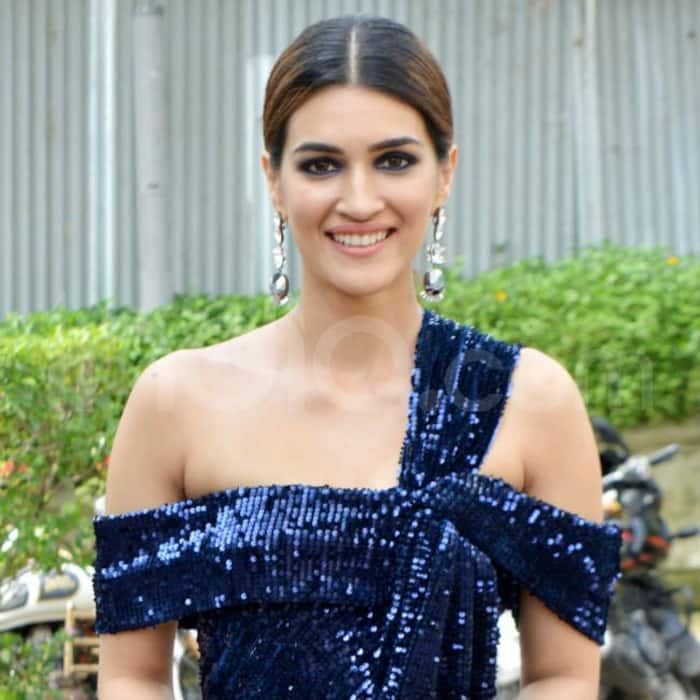 Kriti Sanon Wears A Sparkly Blue Dress With Pink Shoes While Shooting