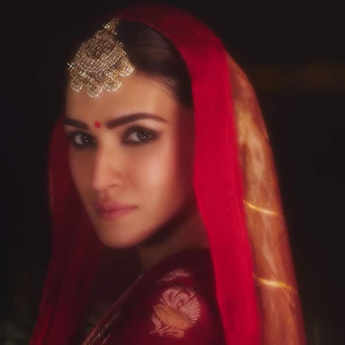 Kriti Sanon is Our B'Town Rani Sa in Traditional Red Banarasi Lehenga and Heavy Tasseled Gajra ...