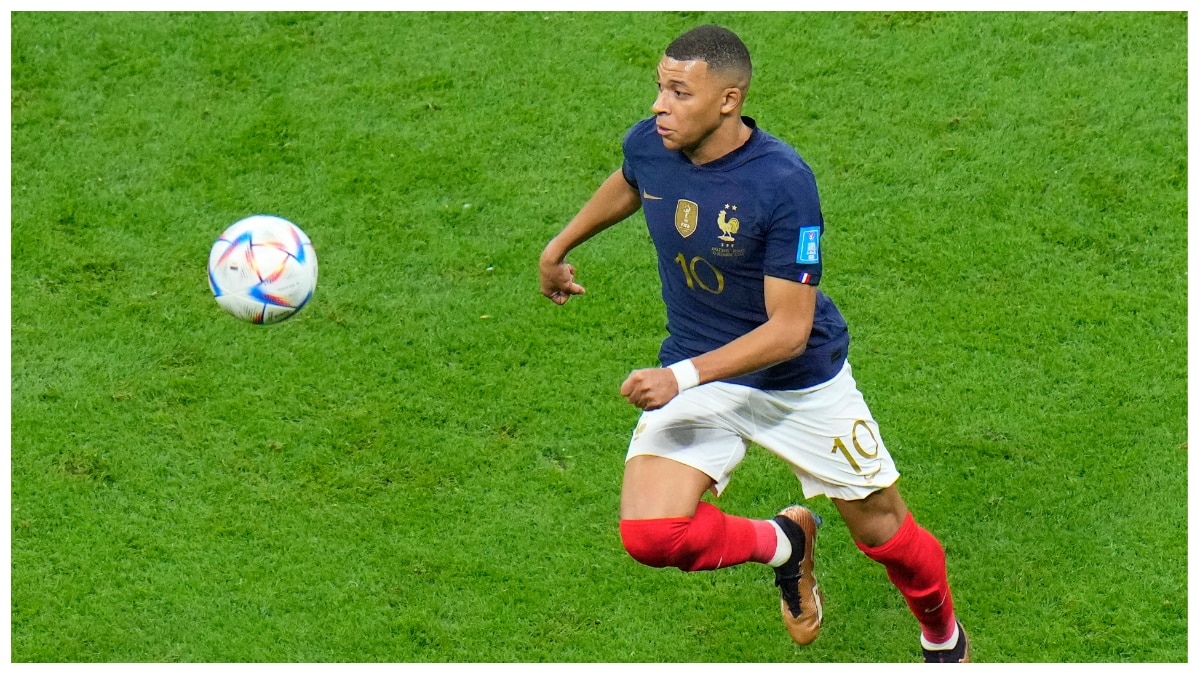 Kylian Mbappe in action against England in a FIFA World Cup 2022 ...