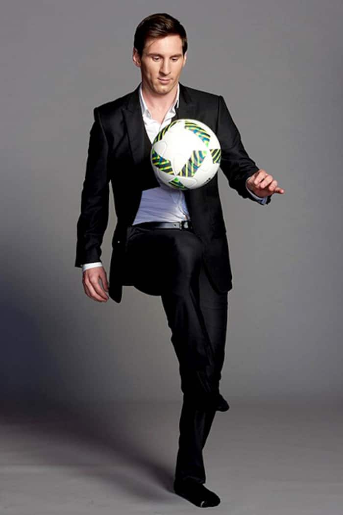 Lionel Messi poses in black formals for Sports Illustrated magazine ...