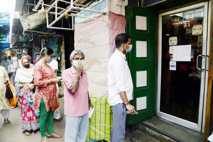 People Practice Social Distancing at Markets