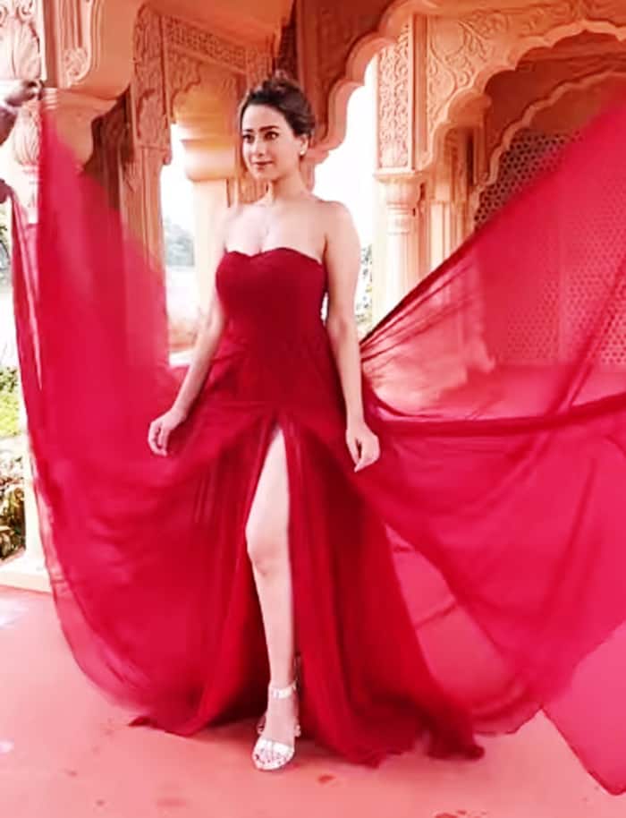 Madalsa Sharma Looks Burning Red Hot In Thigh High Slit Gown