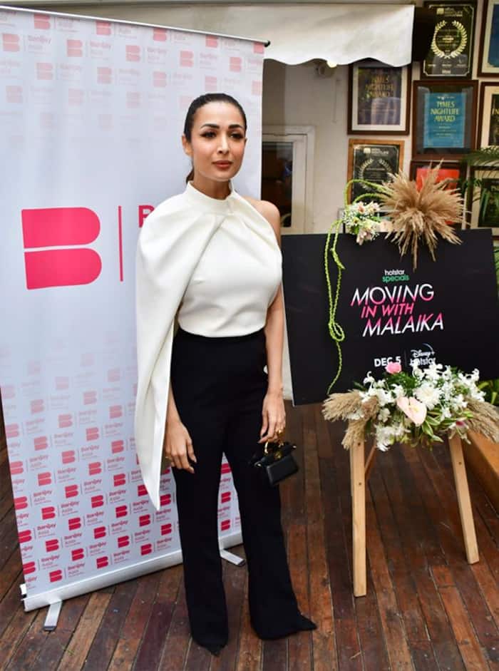 Malaika Arora is a Boss Lady in Black Pants And One-Shoulder High Neck Satin Top - See Viral Photos