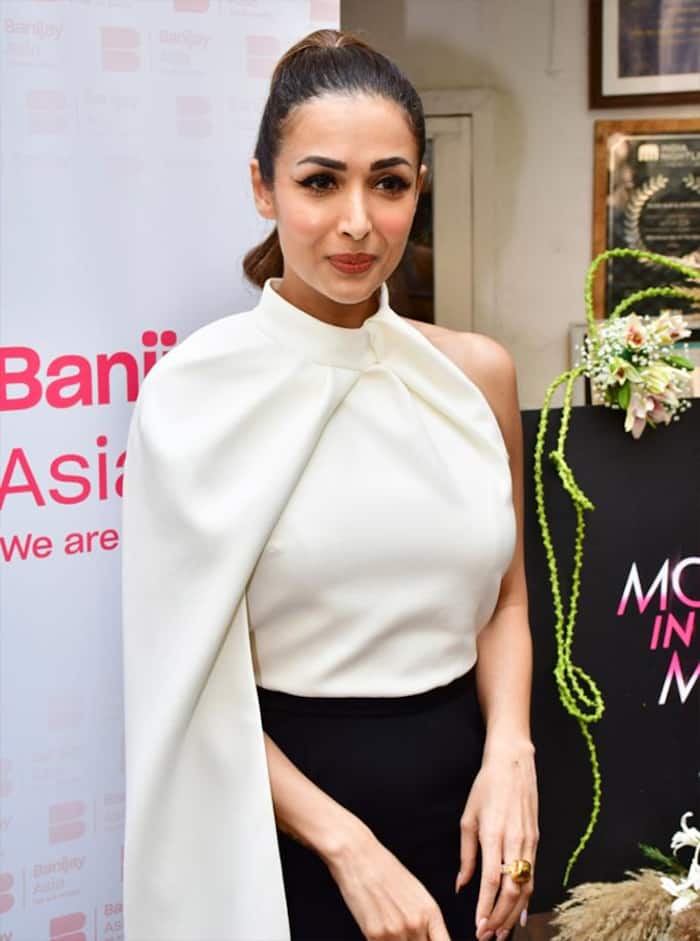 Malaika Arora is a Boss Lady in Black Pants And One-Shoulder High Neck Satin Top - See Viral Photos