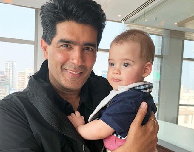 Manish Malhotra with Yash Johar at Karan Johar’s residence
