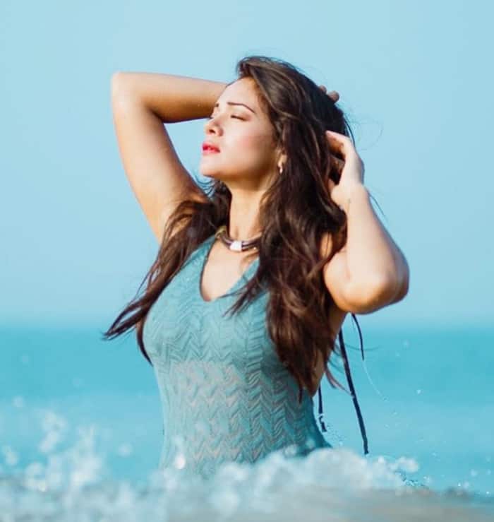 Megha Gupta Goes Bold in Sheer Blue Gown As She Poses in Midst of Ocean ...