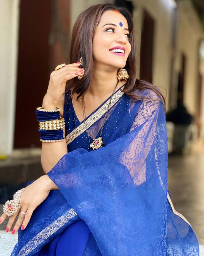 Monalisa looks sultry in a sheer blue saree