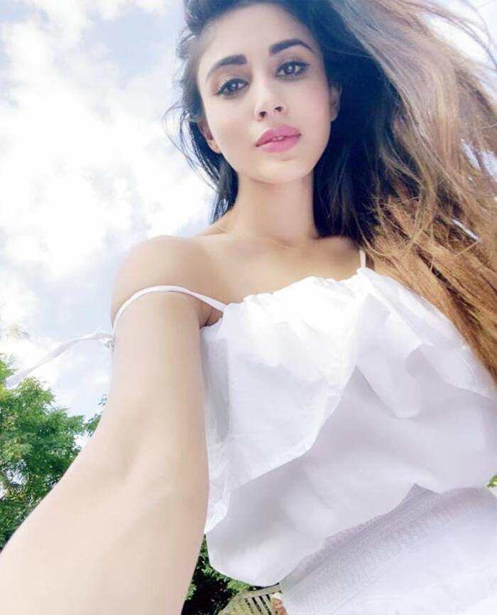 Actor Mouni Roy Struts in a Black Off-shoulder Mini Dress