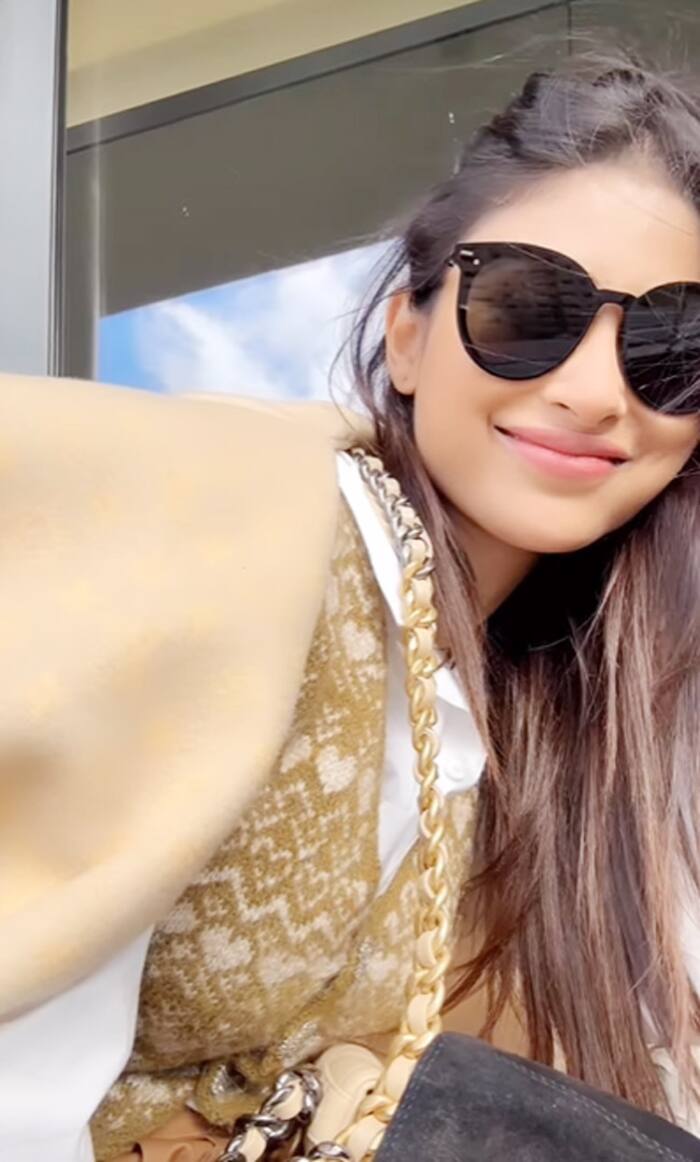 Mouni Roy Turns Sexy School Girl In Mini Beige Pleated Skirt White Shirt And Beige Sleeveless