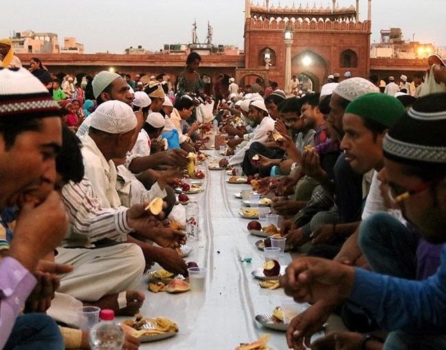 Muslims Break The Fast At Jama Masjid