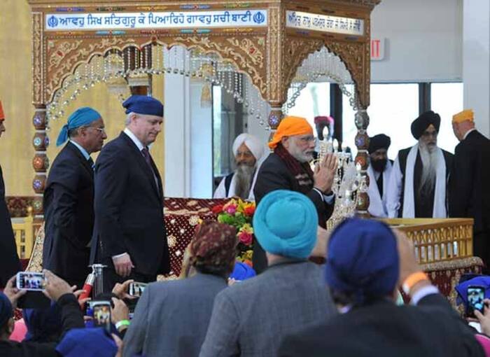 Narendra Modi addresses at the Laxmi Narayan Temple, meets Christy ...
