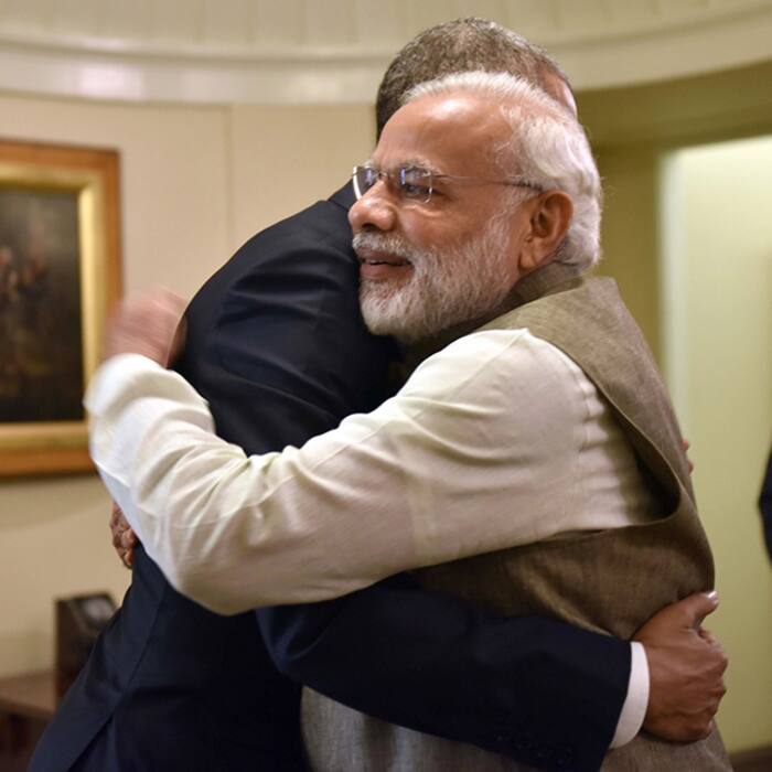 Narendra Modi meets Barack Obama; promise to work together of global ...